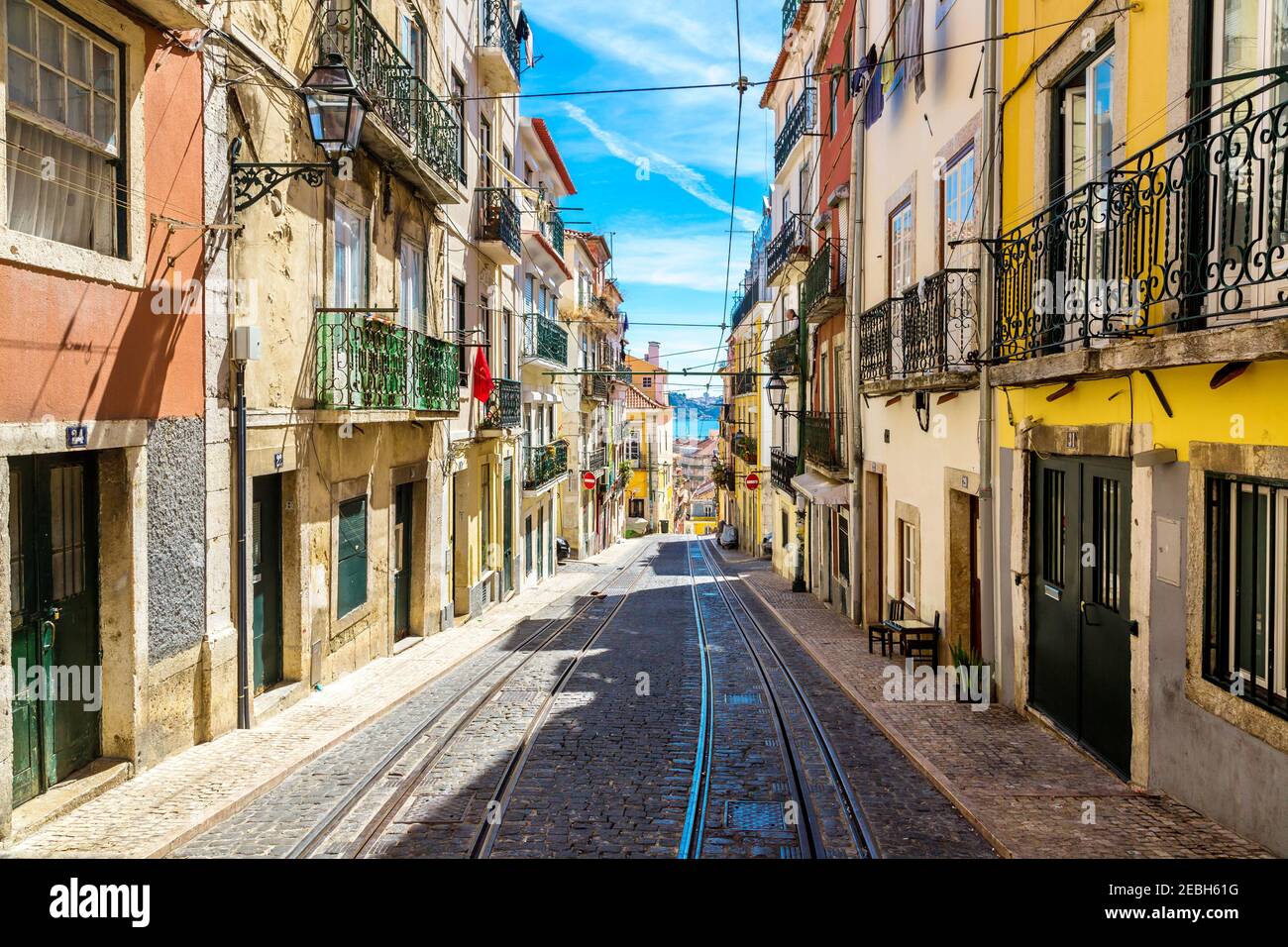 Old Lisbon street in a beautiful summer day Stock Photo - Alamy