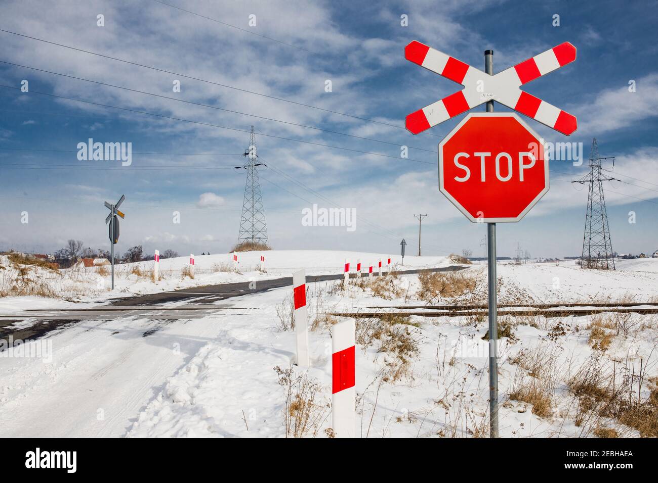 A "stop" traffic sign erected in front of an unguarded railroad ...