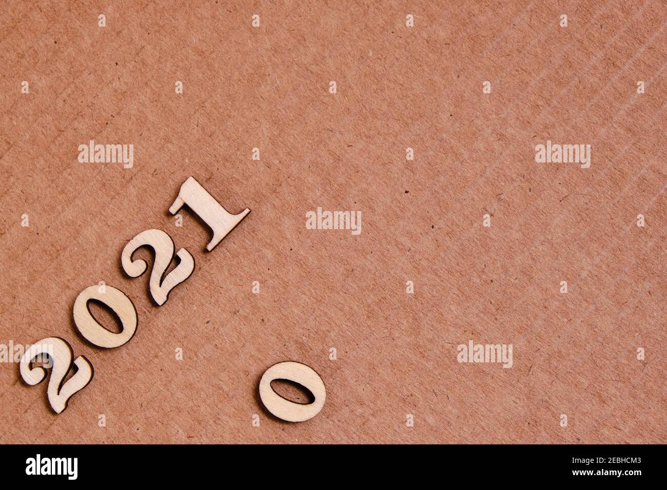 Number two thousand twenty first year is laid out on a cardboard ...