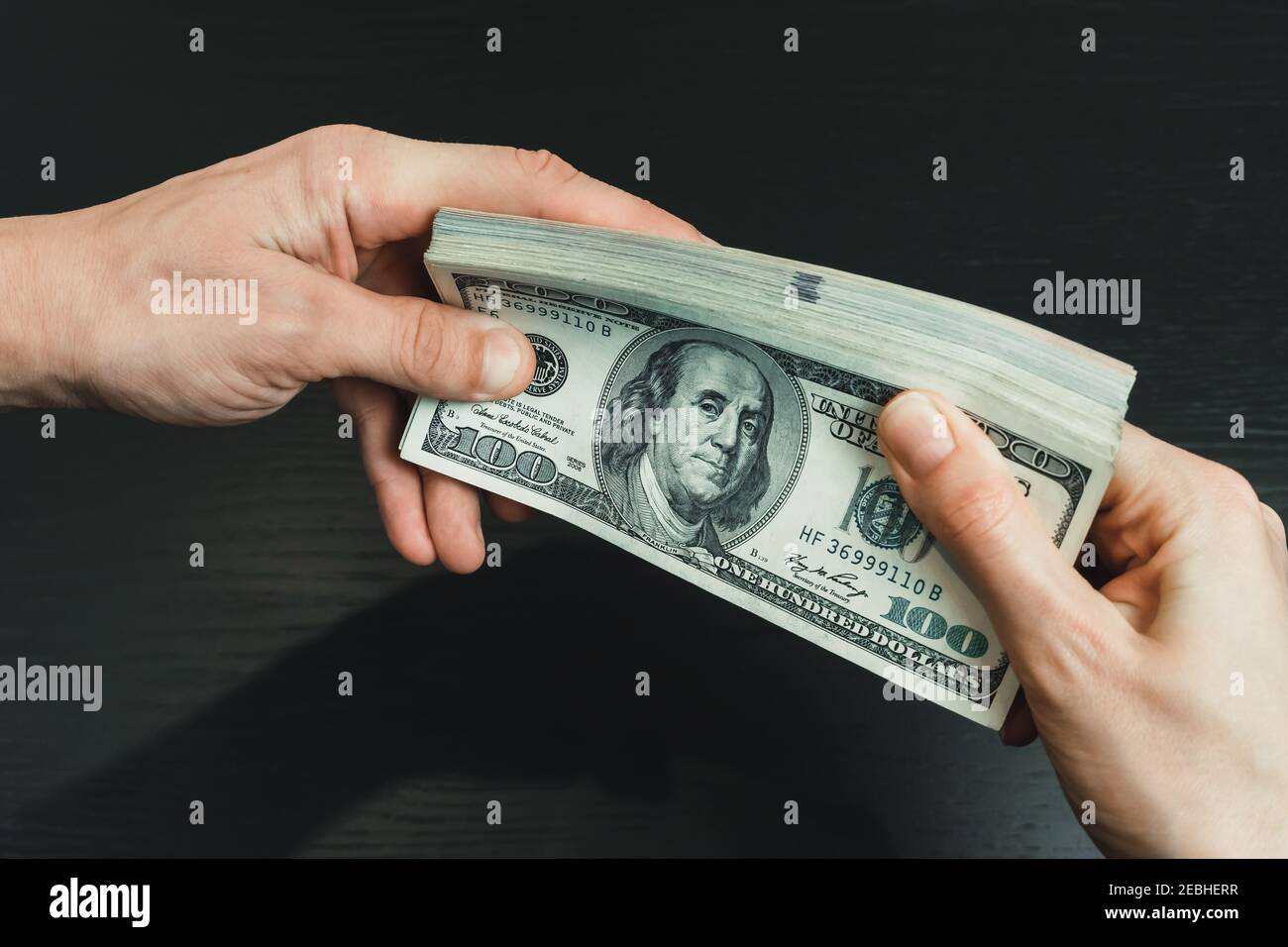 Man holding wad money hi-res stock photography and images - Alamy