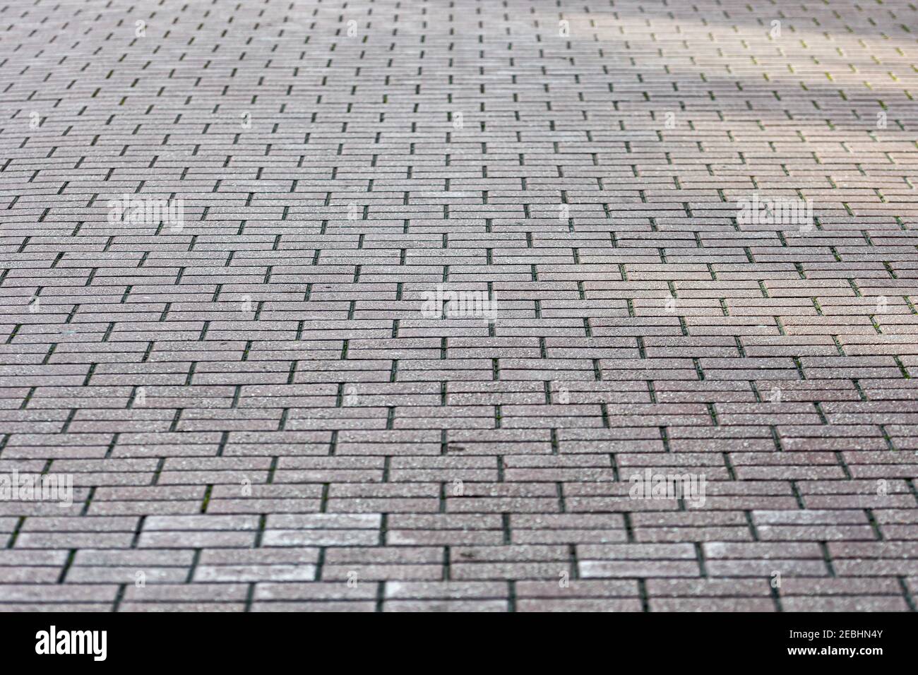 perspective view monotone gray brick stone pavement, texture background ...