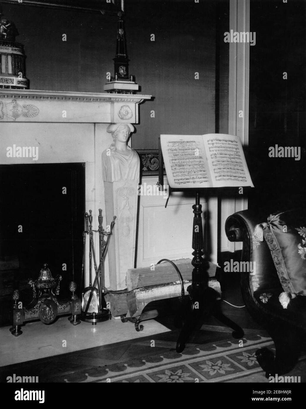 White House Rooms: East, Red. View of fireplace and music stand in the ...