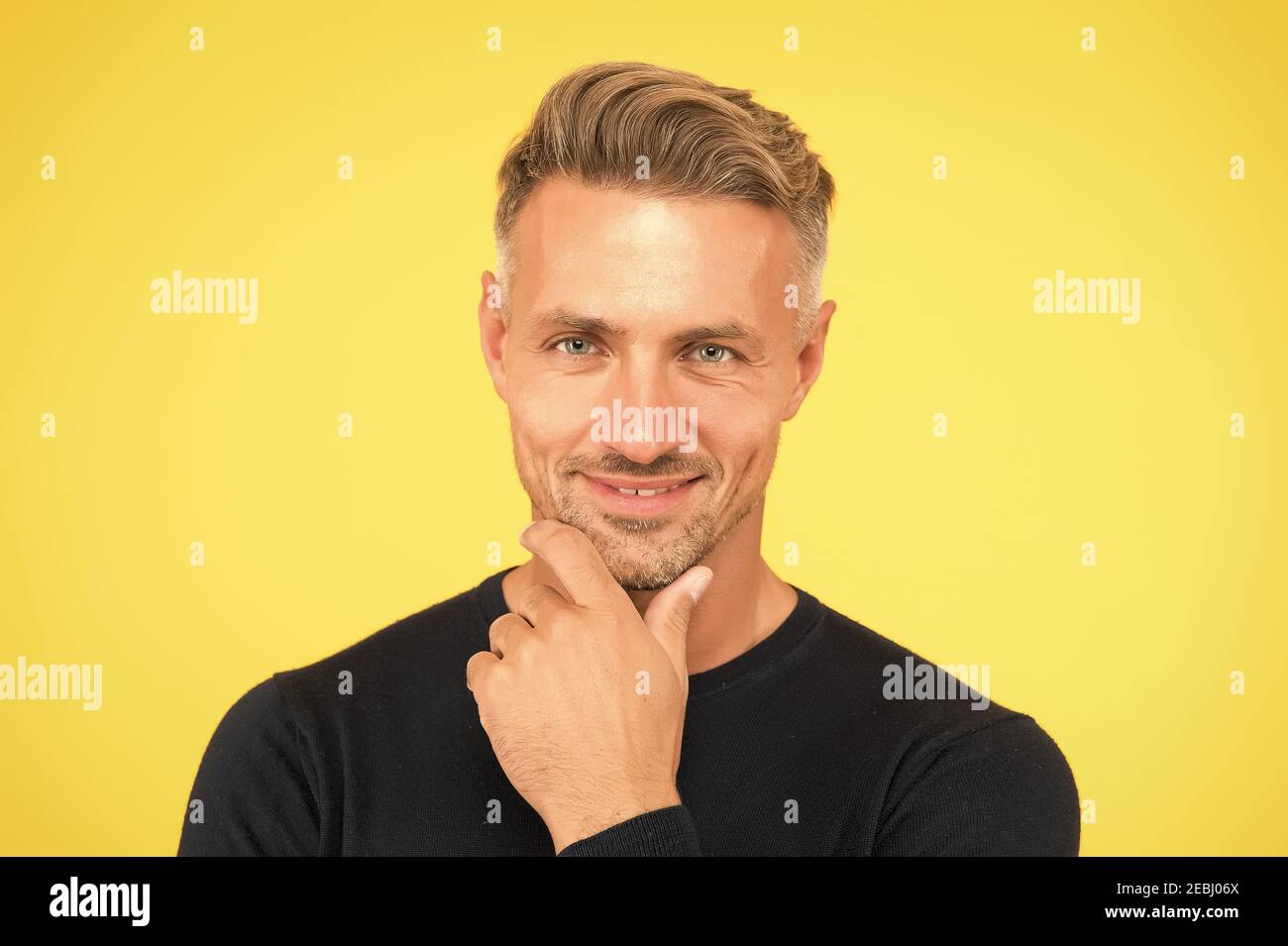 His beard is unshaven. Unshaven man yellow background. Unshaven look of ...