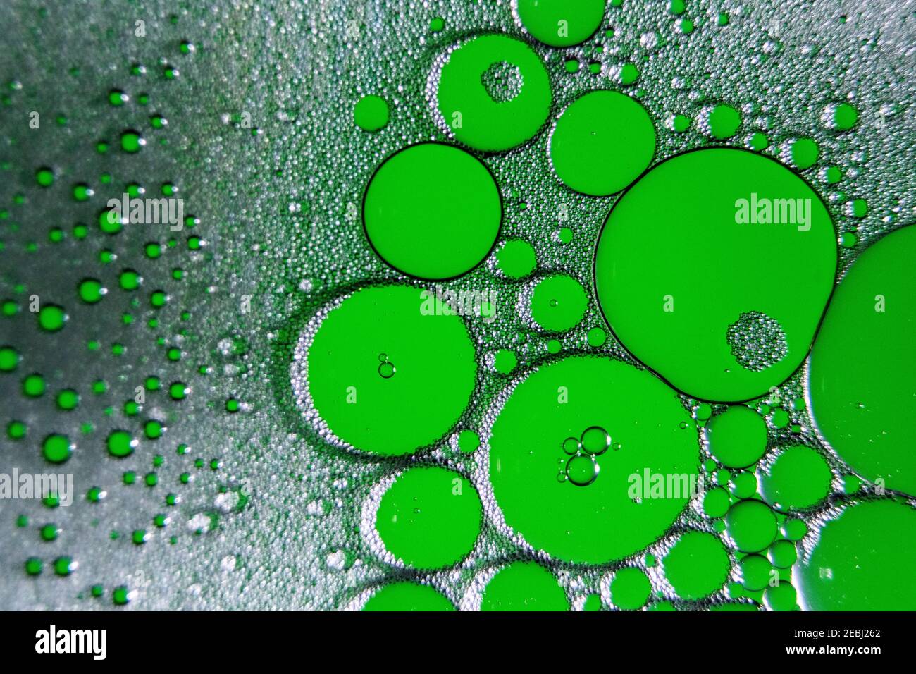 Colorful oil drops on a water surface ideal for background Stock Photo ...