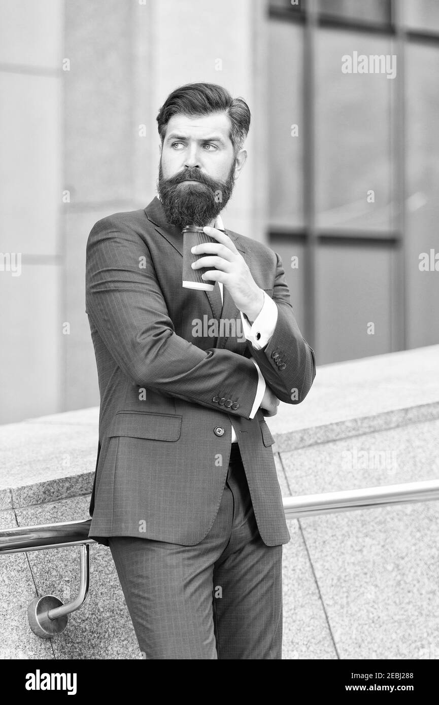 Successful man owner of business company has coffee break. handsome guy ...