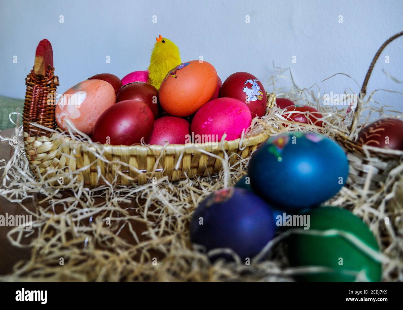 Unique hand painted Easter eggs in basket. Traditional decoration for ...