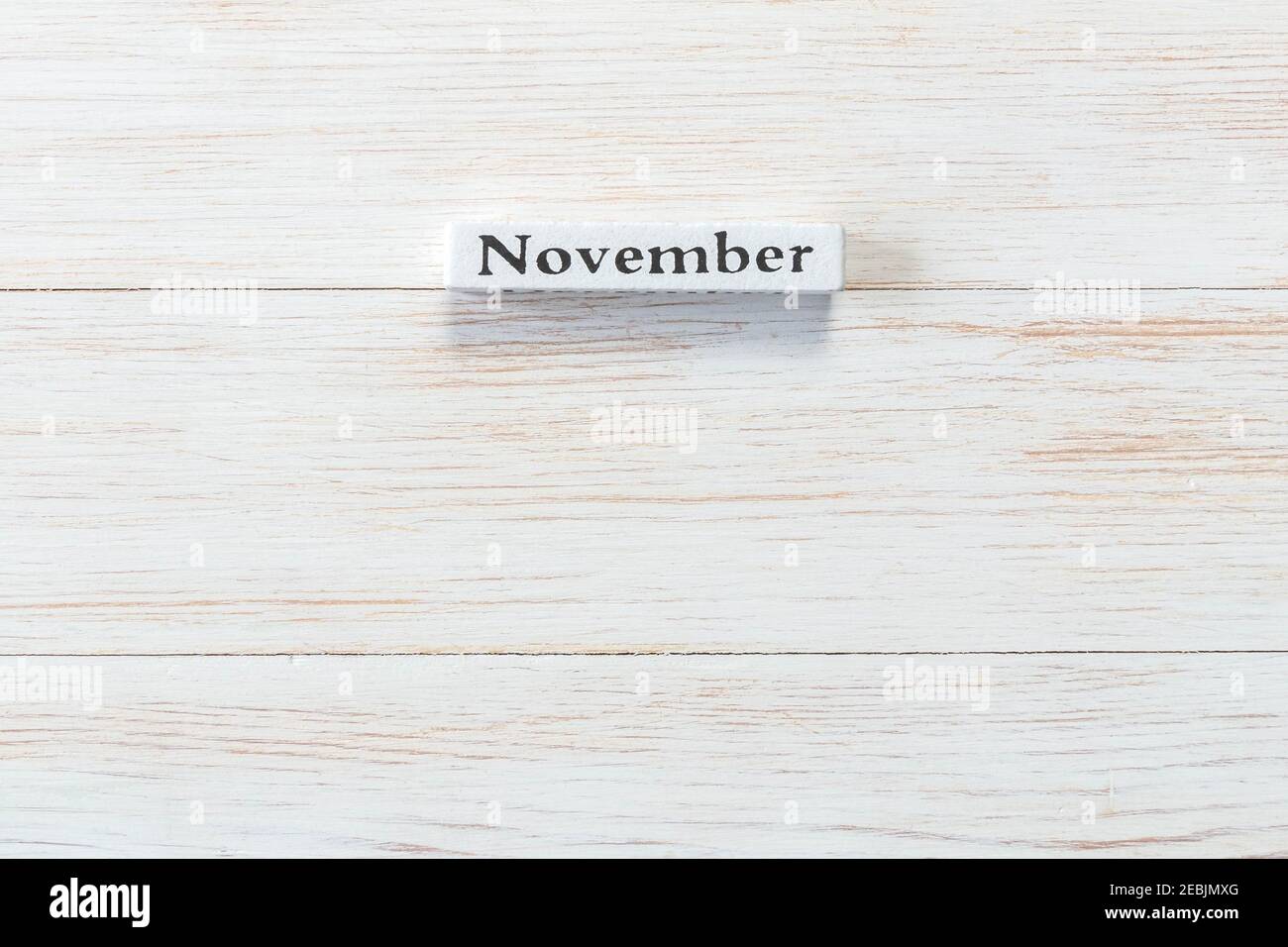 Whine wooden block of calendar with month November on vintage ...
