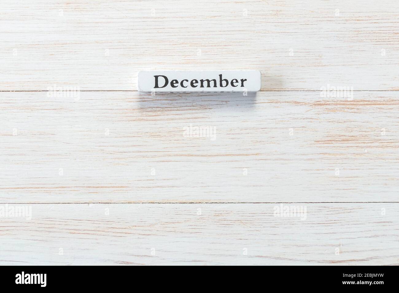 Whine wooden block of calendar with month December on vintage ...