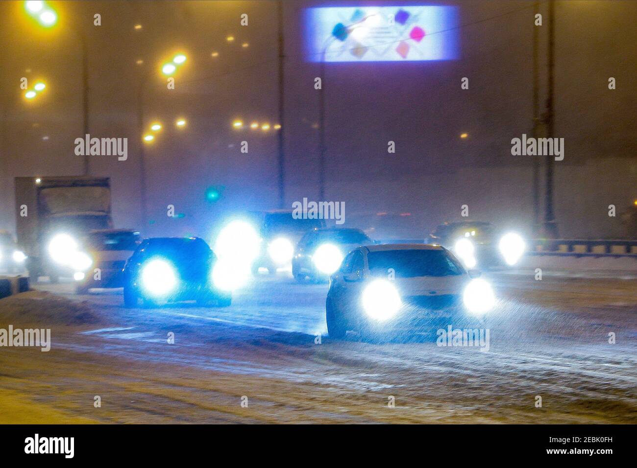 Heavy snowfall in Moscow, Russia. Car in traffic heacy snowfall Stock ...