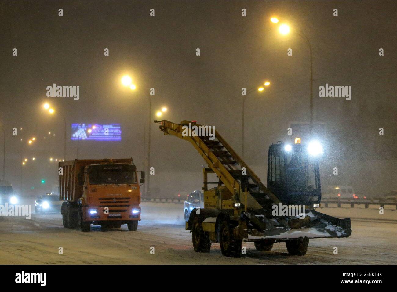 Heavy snowfall in Moscow, Russia. Car in traffic heacy snowfall Stock ...