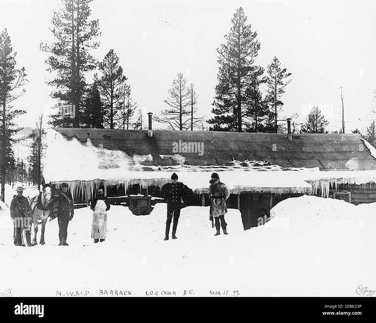 North-West Mounted Police officers standing in front of barracks, Log ...