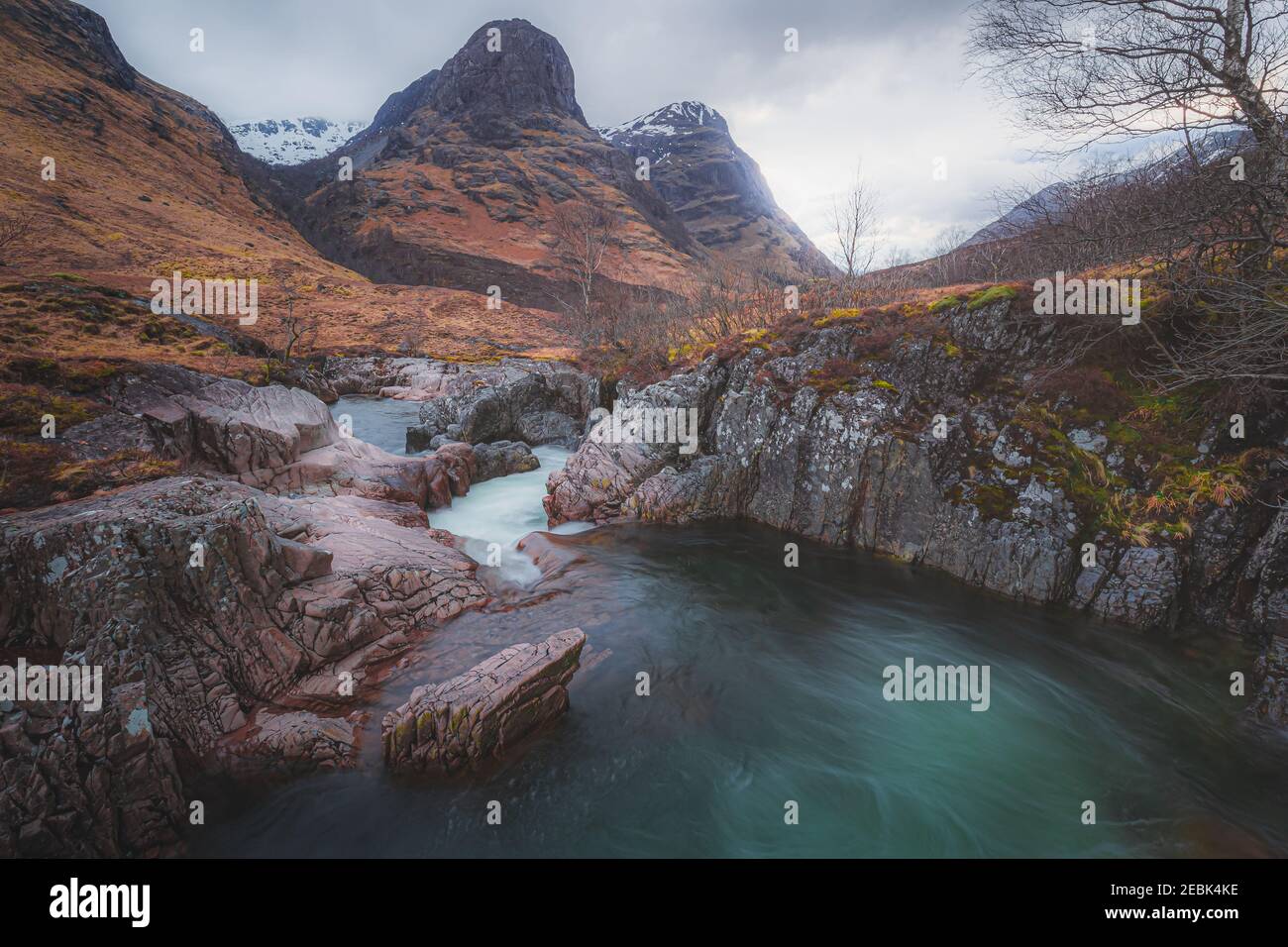 Hidden waterfall landscape along the River Coe flowing towards Beinn ...