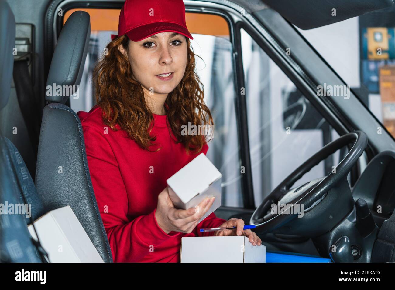Delivery driver handing hi-res stock photography and images - Alamy