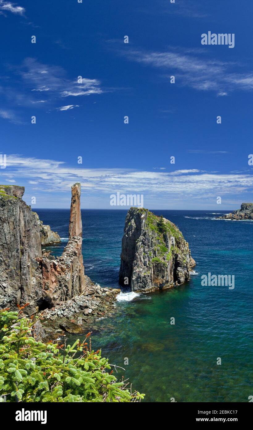 Prominent igneous rock sea stack, The Chimney, at Spillars Cove in ...