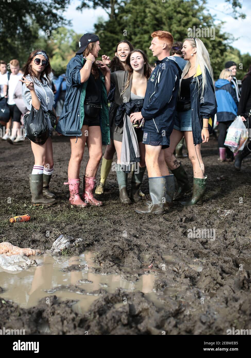 Fans arriving at a muddy 2015 Reading festival Stock Photo - Alamy