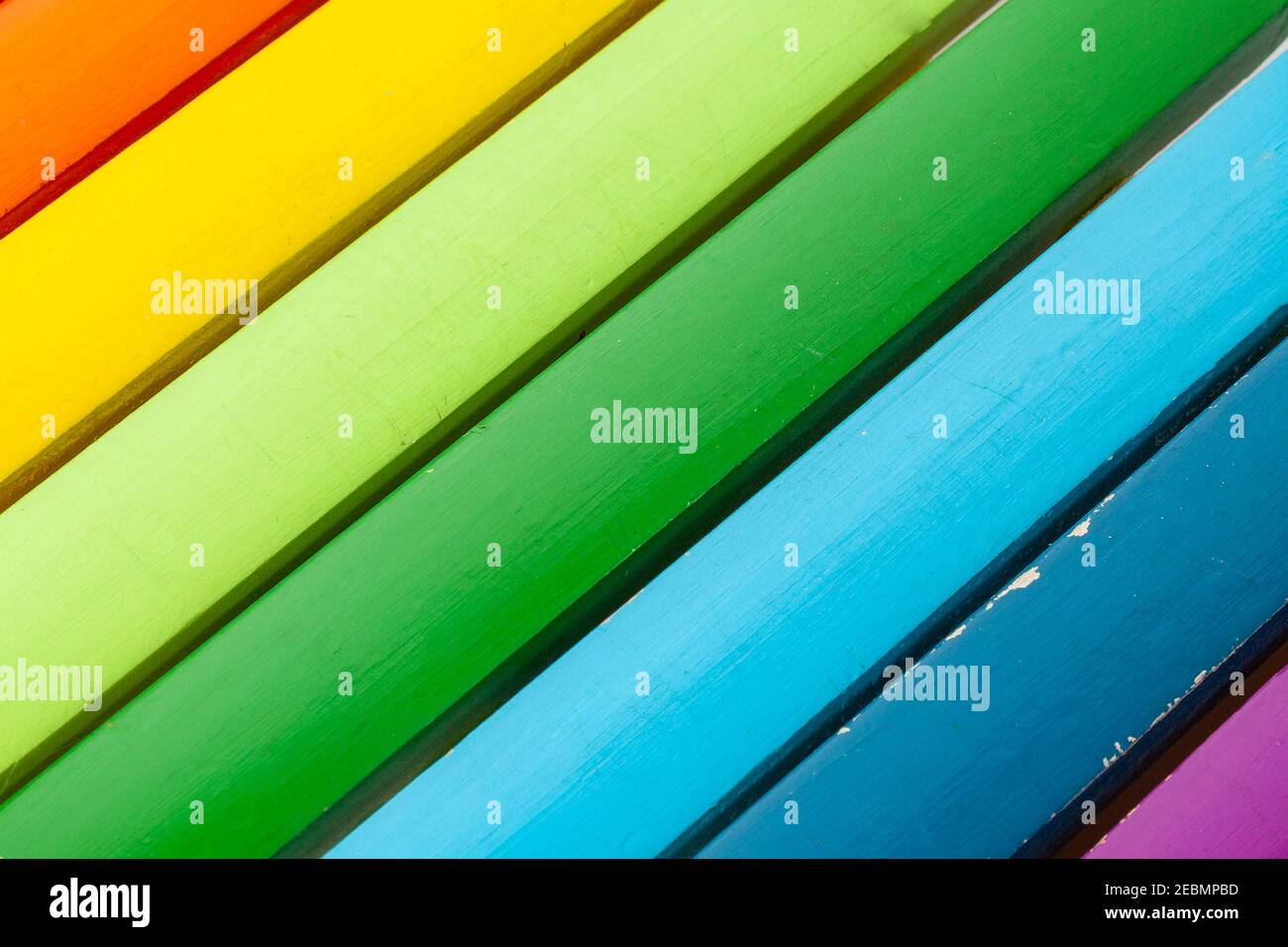 Background image of diagonal multicolored wooden slats Stock Photo - Alamy