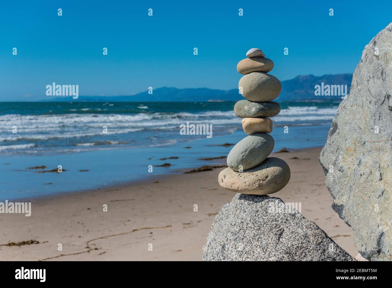 Ocean stones piled high Stock Photo - Alamy