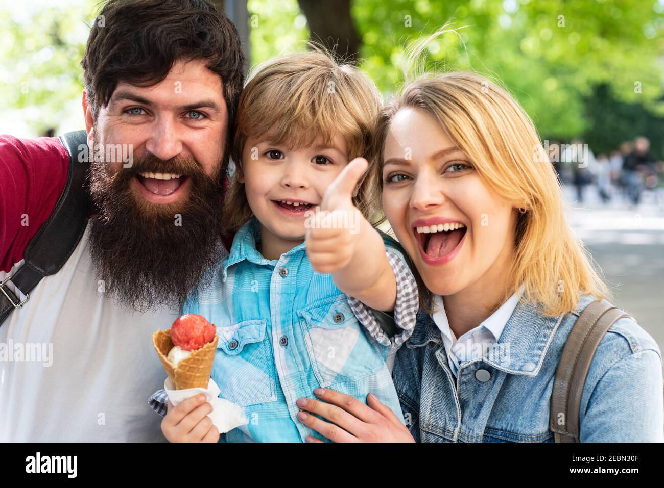 Family eat icecream outdoor. Junk food. Delicious summer ice cream ...