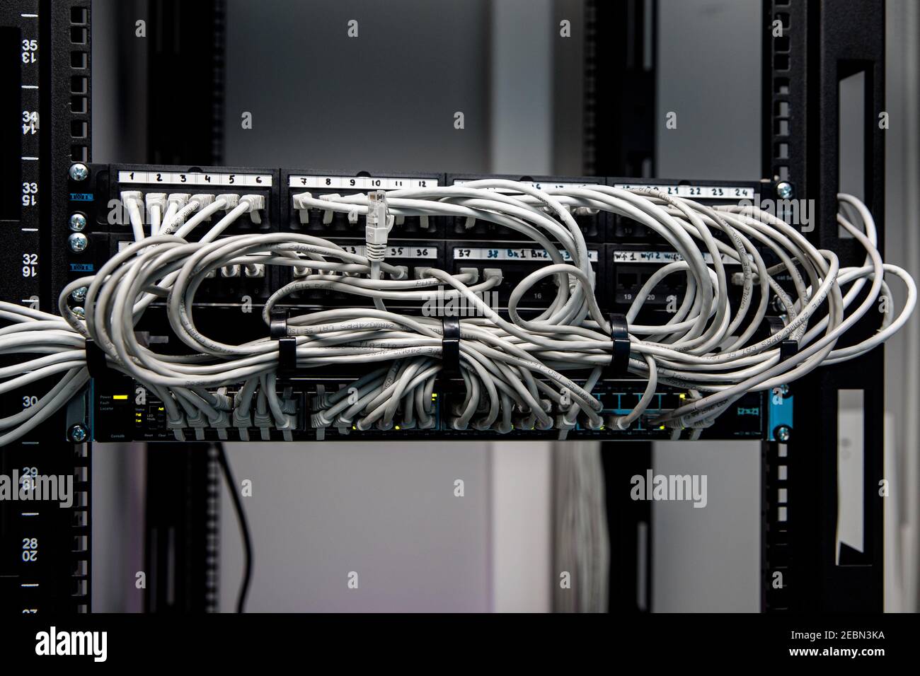 A lot of network cables connected in a big network switch Stock Photo ...