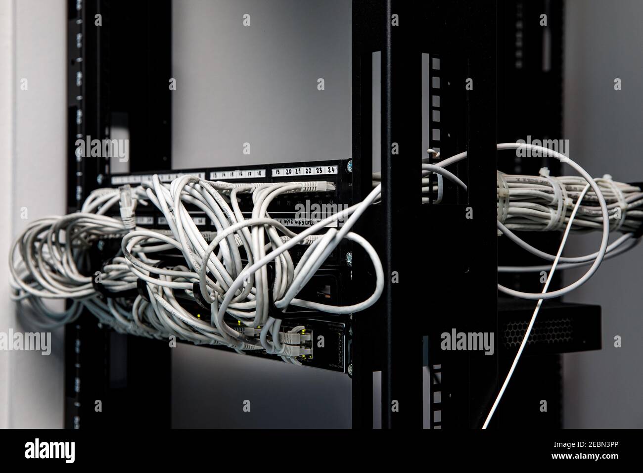 A lot of network cables connected in a big network switch Stock Photo ...