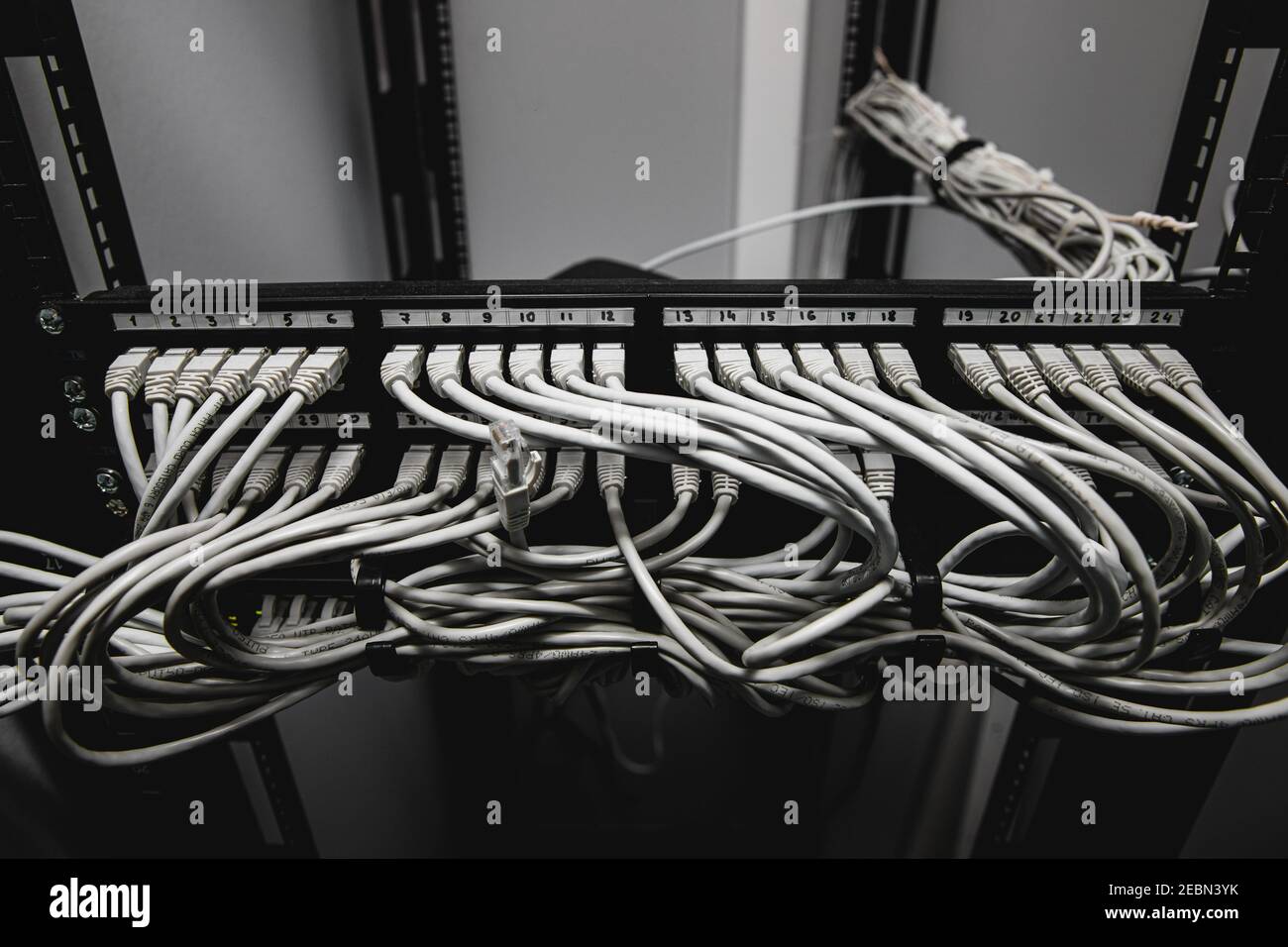 A lot of network cables connected in a big network switch Stock Photo ...
