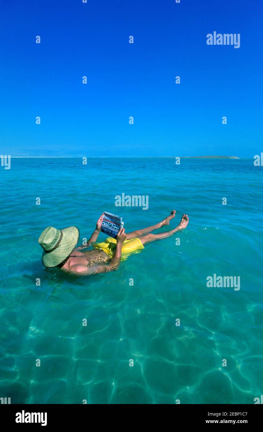 Dead sea floating reading hi-res stock photography and images - Alamy