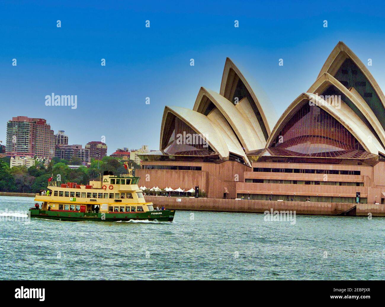 A ferry passes by the Sydney Opera House Stock Photo - Alamy