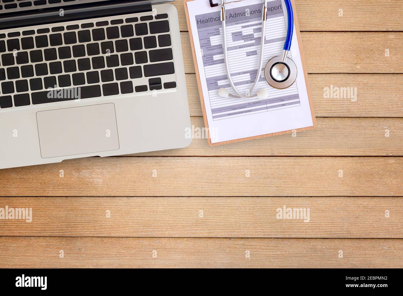 Blue stethoscope and laptop computer on office table background. Top ...