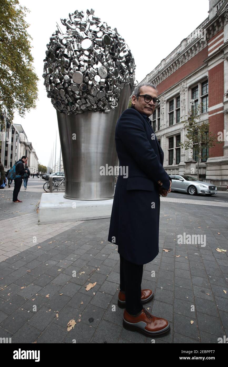 The artist Subodh Gupta poses for photos in front of his new ...