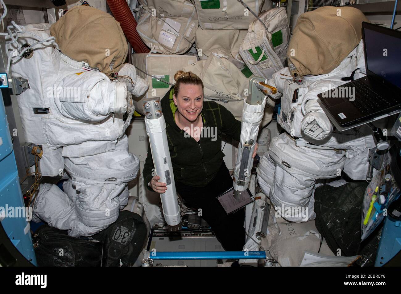 NASA astronaut and Expedition 64 Flight Engineer Kate Rubins inspects ...