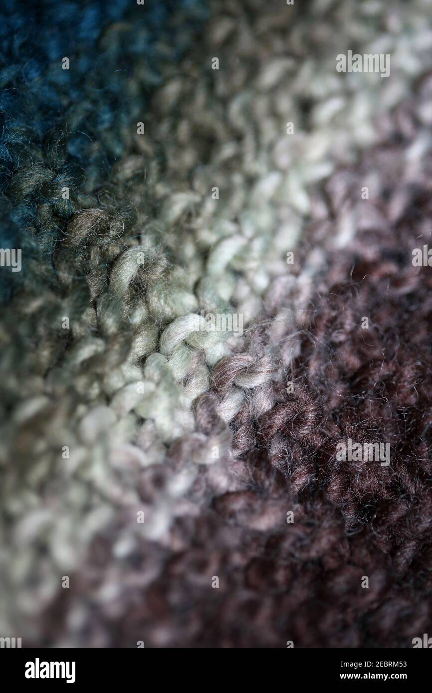 Colorful handmade winter scarf with alpacas wool macro background ...
