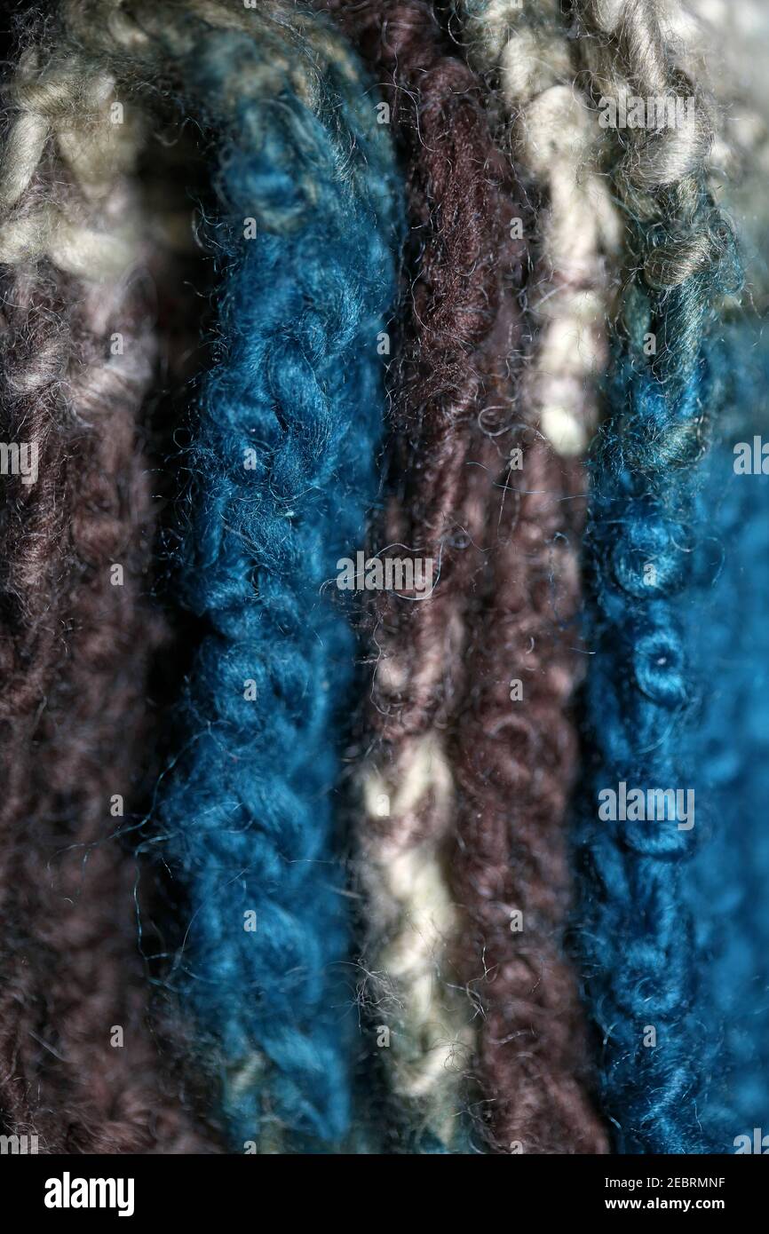 Colorful handmade winter scarf with alpacas wool macro background ...