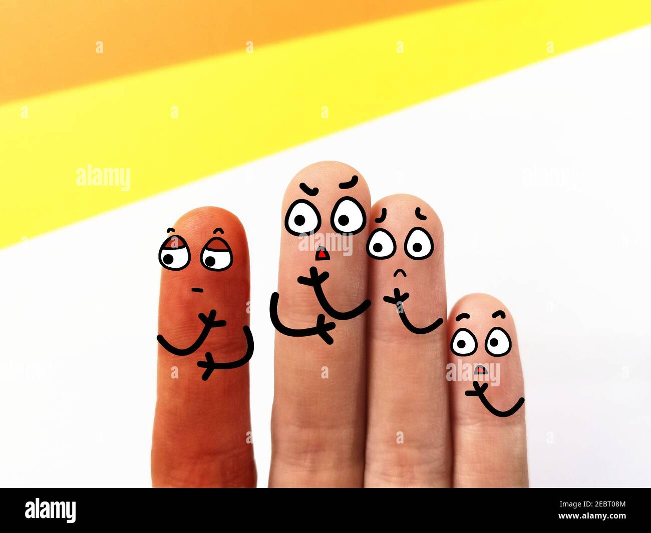 Four fingers are decorated as four person. Three of them discriminate a ...