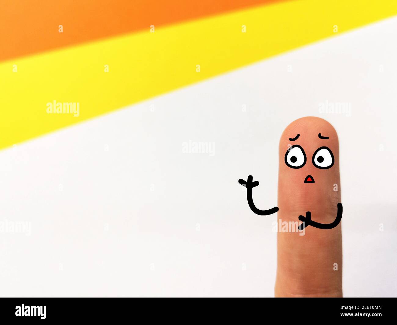 One finger is decorated as one person. He is confused and sad Stock ...