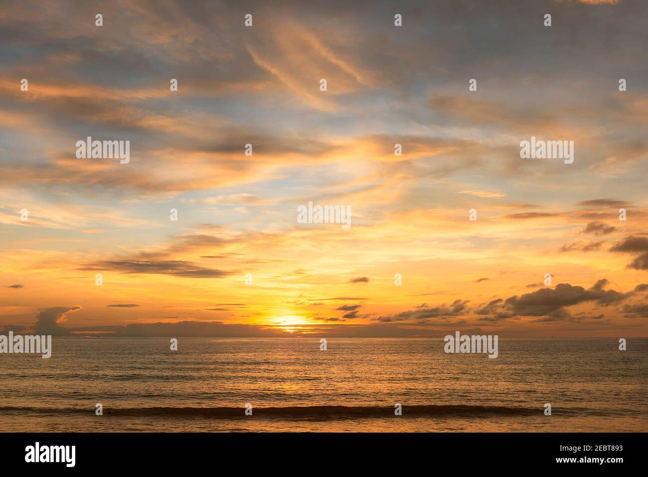 Beautiful sunset over the clam sea with cloud and sky background ...