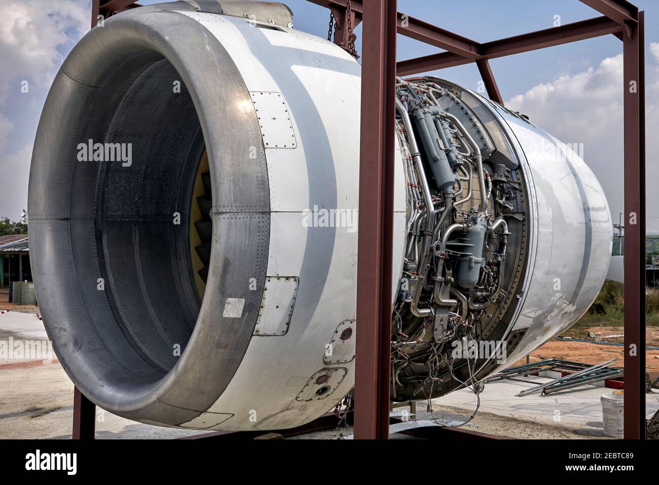 Jet engine detail, Aircraft engine hoisted on a frame structure and ...