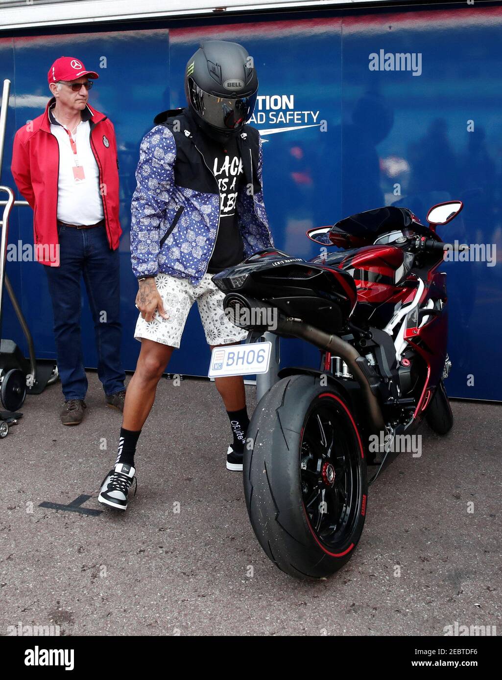 Car alongside motorbike hi-res stock photography and images - Alamy