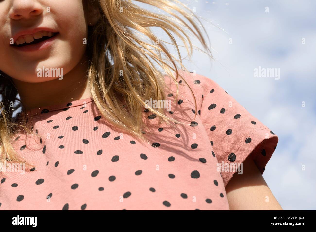 Girl cloudy sky sky hi-res stock photography and images - Alamy