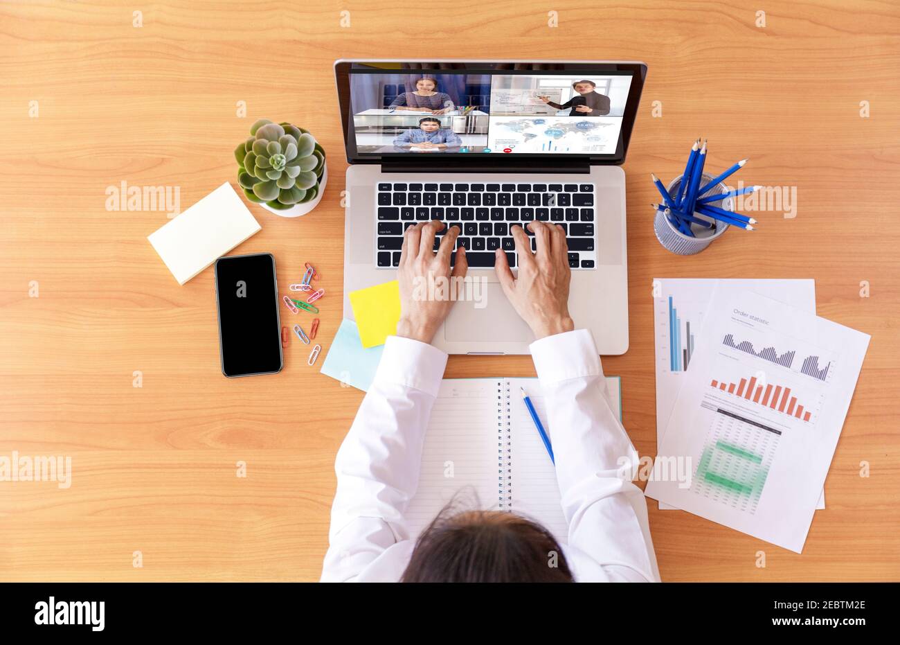 Top view Businessman and businesswoman analysis financial chart with ...