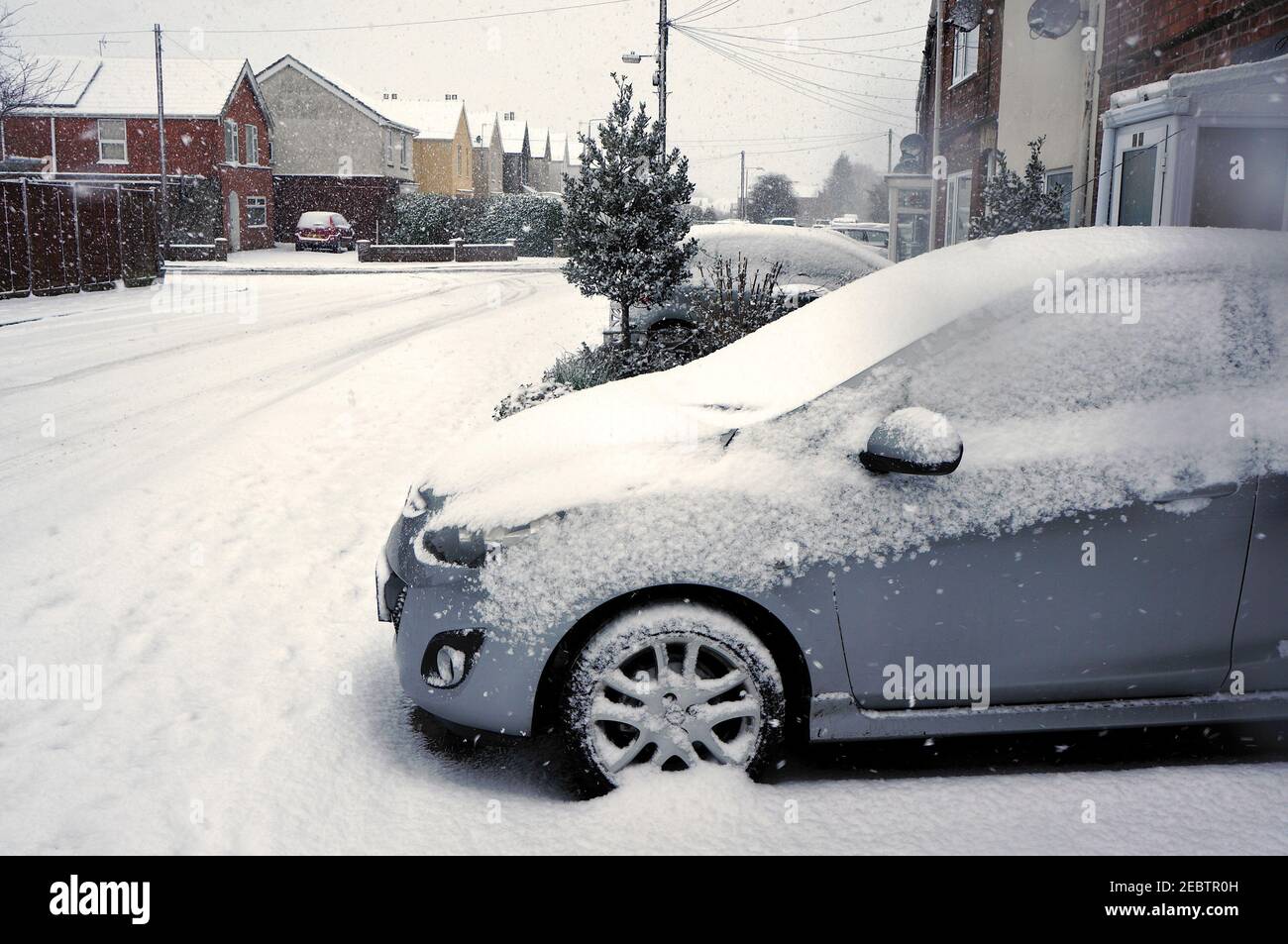 Car covered snow during snowstorm hi-res stock photography and images ...