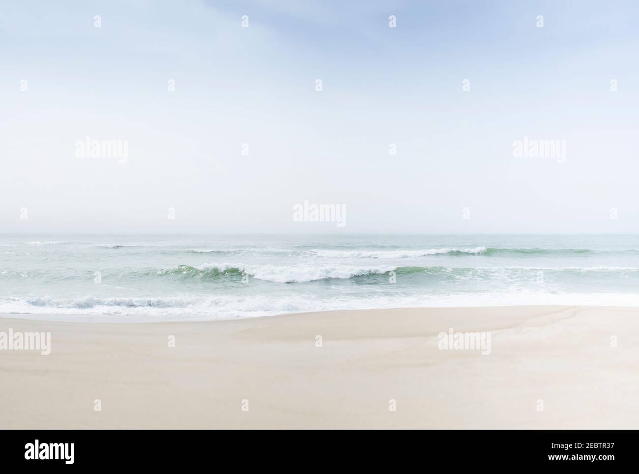 Fog over sea waves Stock Photo - Alamy