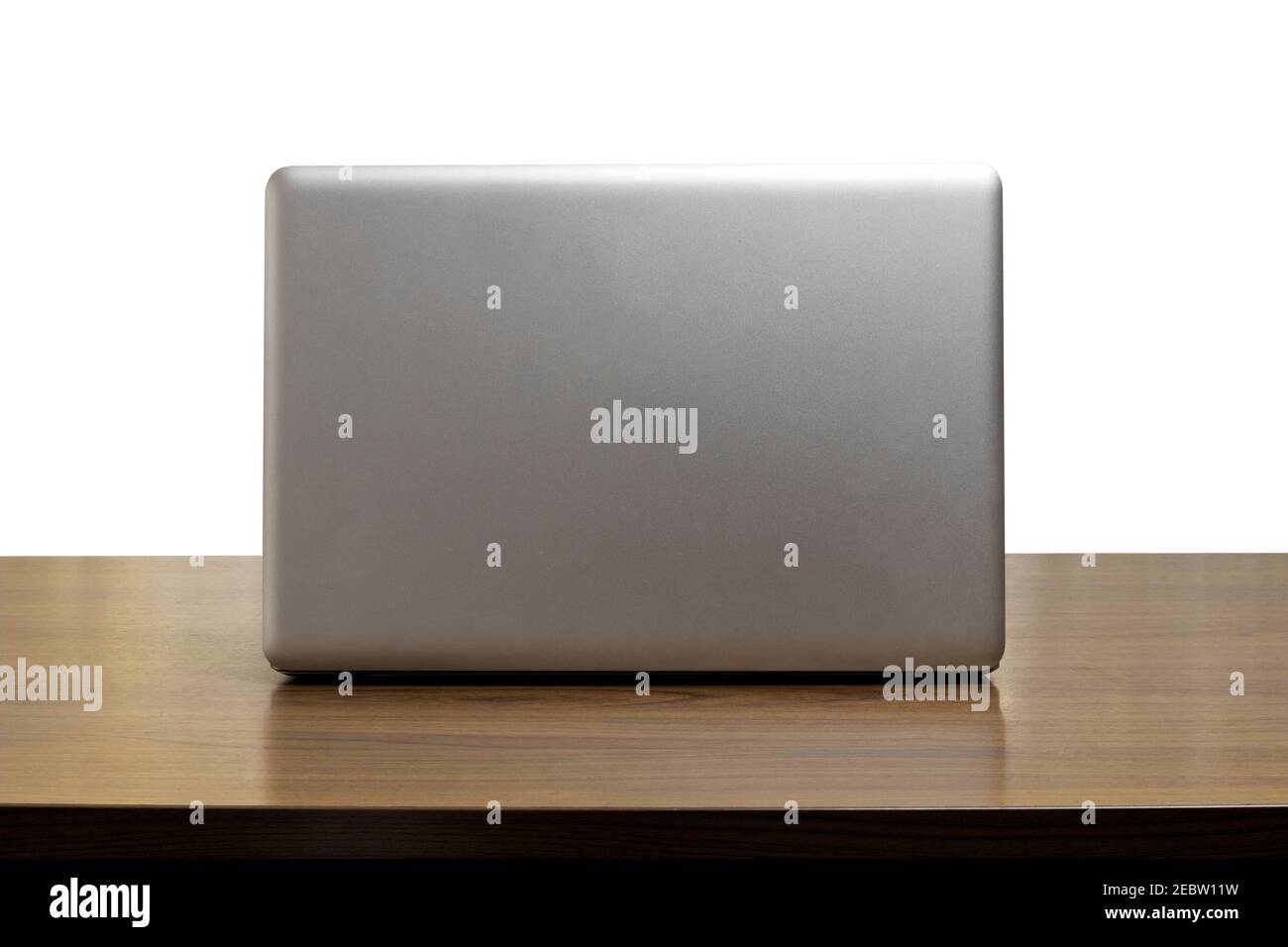 Back side laptop or notebook on wood table white background. back side ...