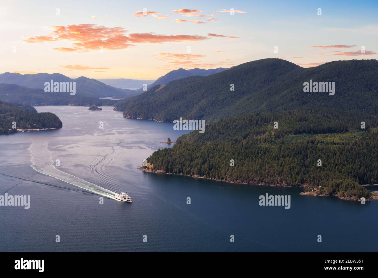 Aerial view of the Ferry traveling between the islands Stock Photo - Alamy
