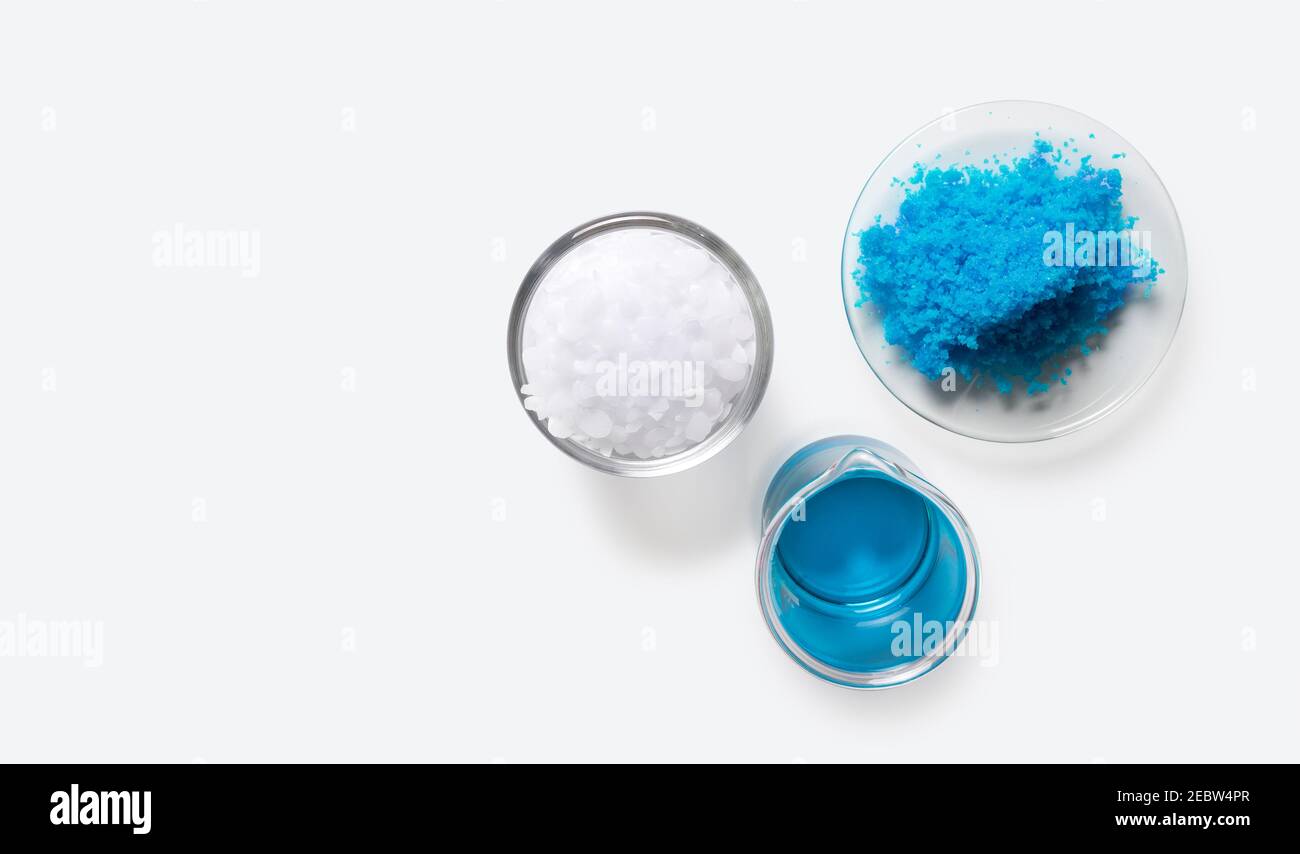 Inorganic chemical on white laboratory table. Copper(II) sulfate ...