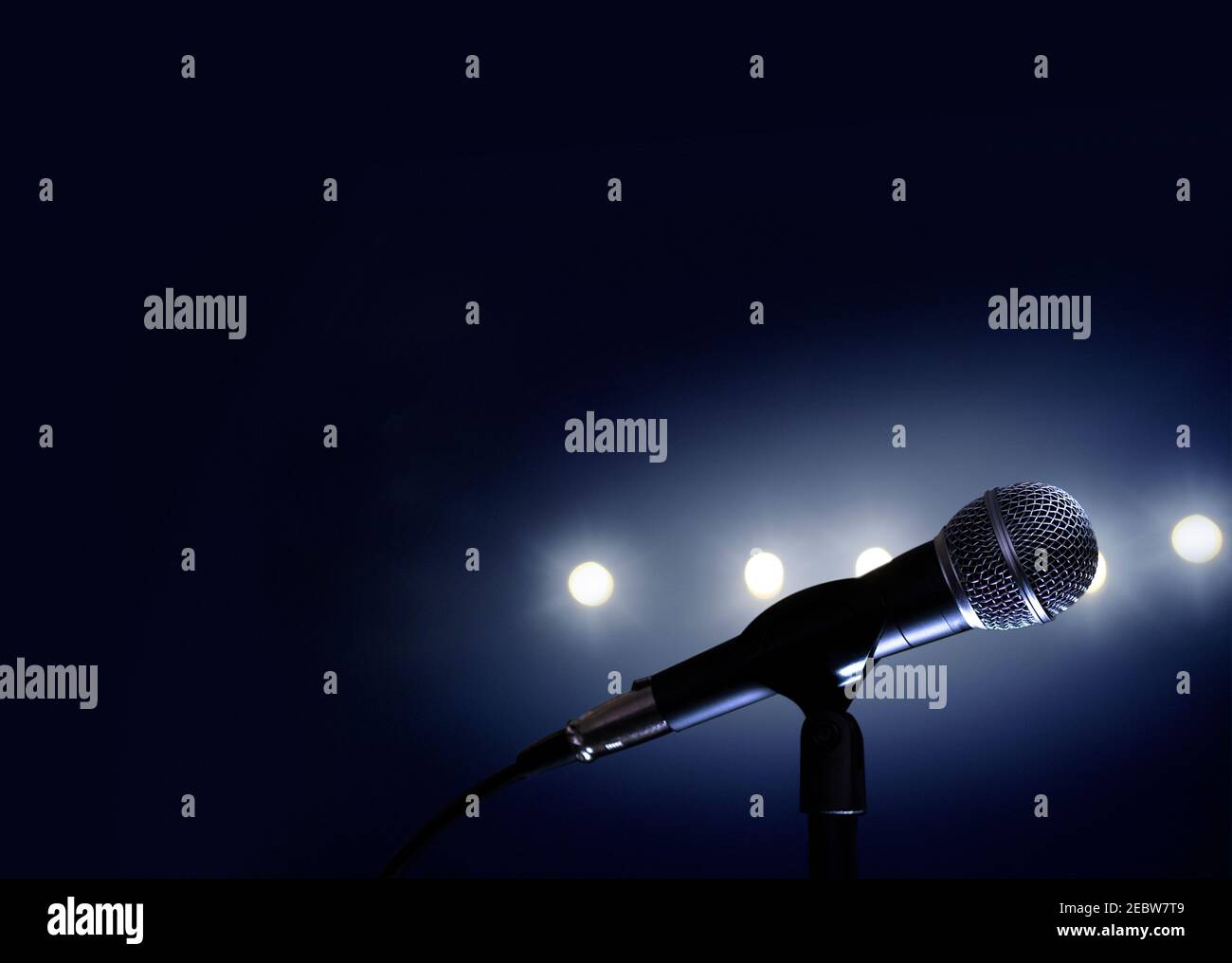 Microphone and stage lights Stock Photo - Alamy