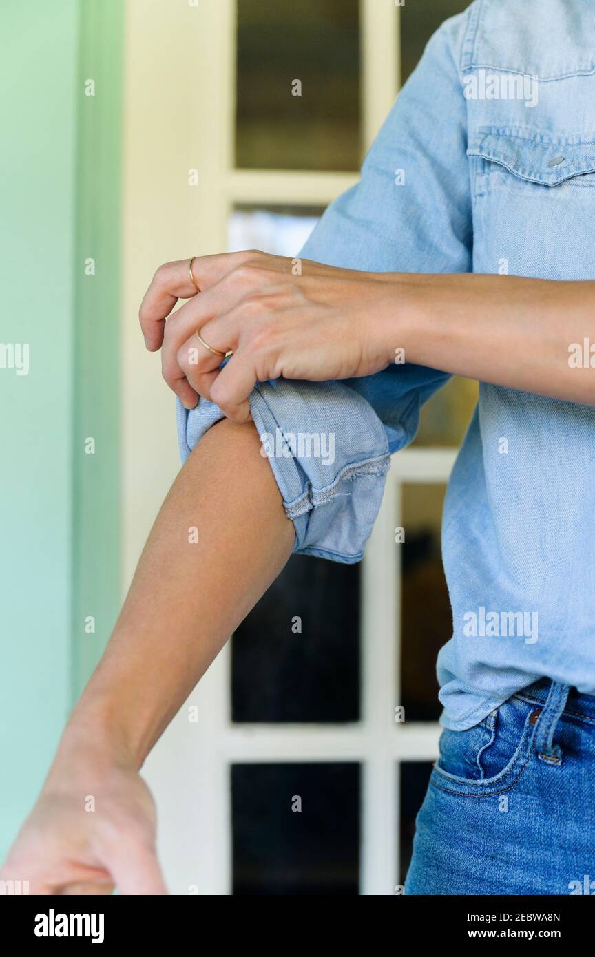 Rolled up sleeve hi-res stock photography and images - Alamy