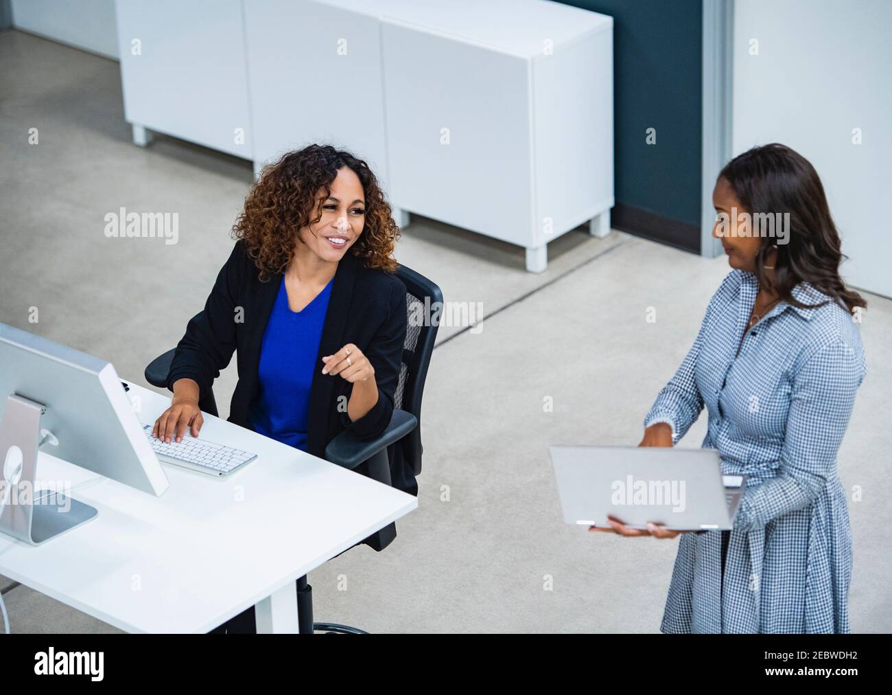Business people working in office Stock Photo - Alamy