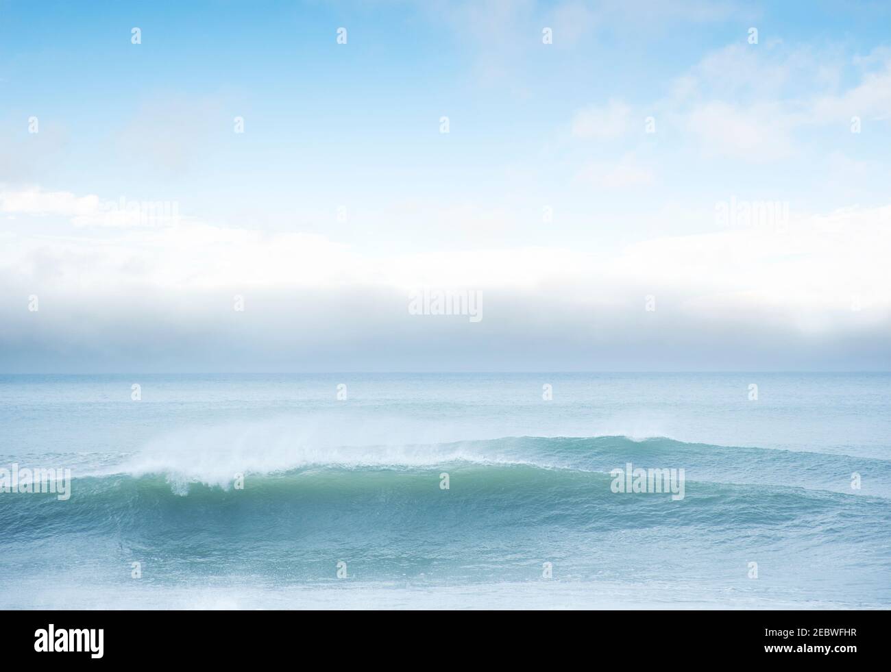 Fog over sea waves Stock Photo - Alamy