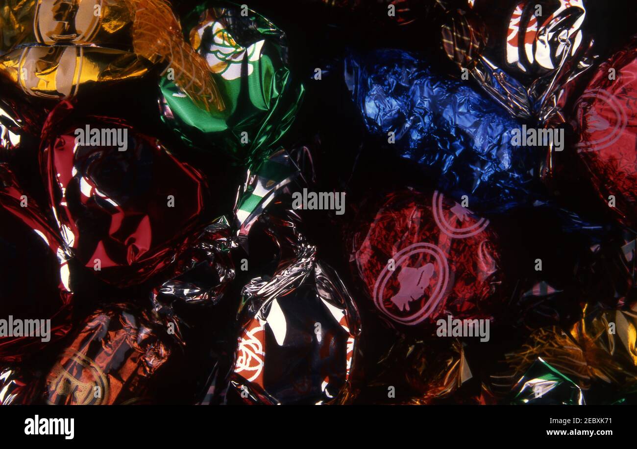 COLOURFULLY WRAPPED ASSORTED CHOCOLATES Stock Photo - Alamy