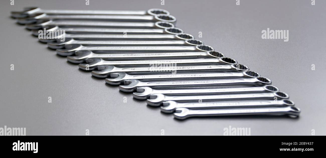 Cut-out wrenches horizontally placed from the biggest to the smallest ...
